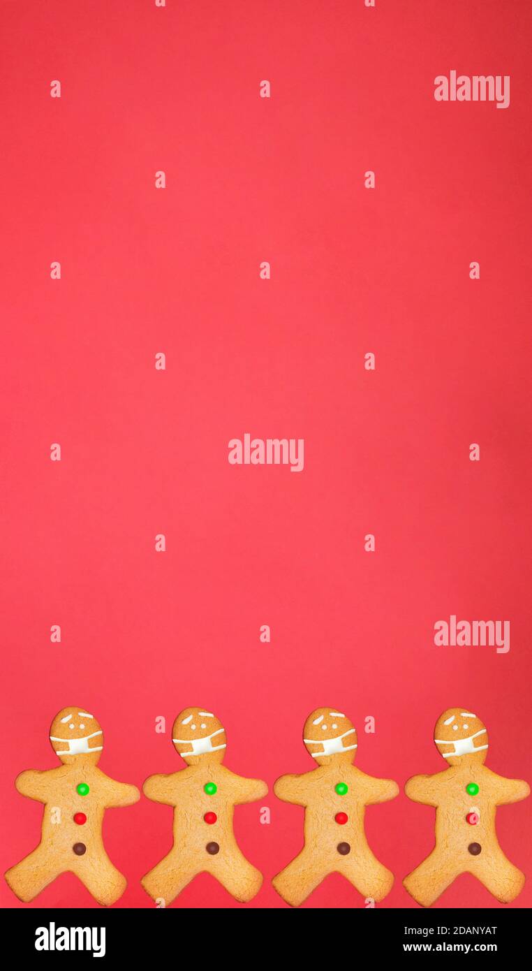 Red background with gingerbread men - Christmas background Stock Photo ...