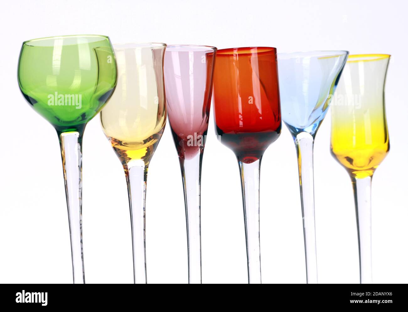 Collection of colorful glassware on white background Stock Photo - Alamy