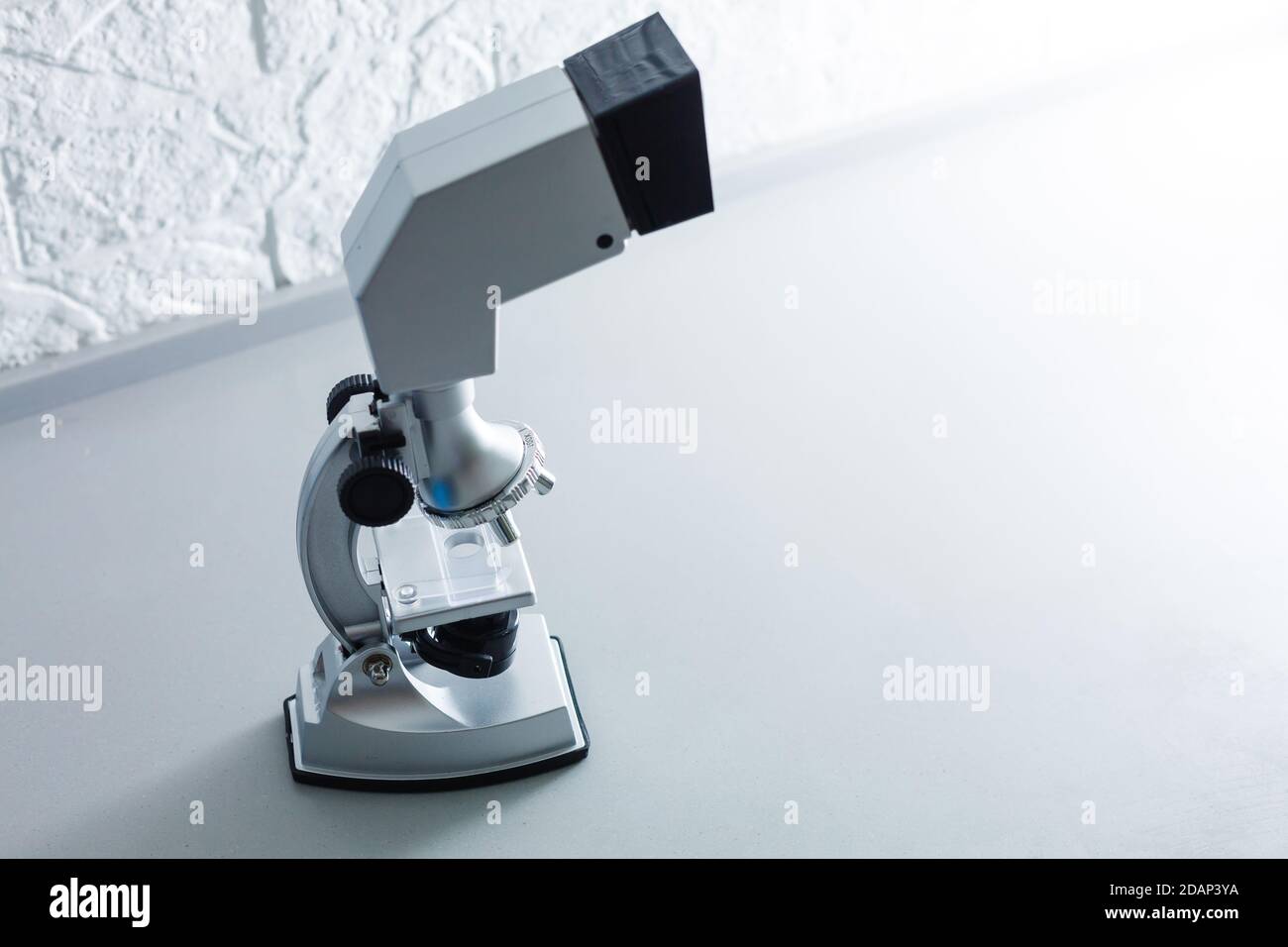 Laboratory lens of Microscope blue scientific research background Stock ...