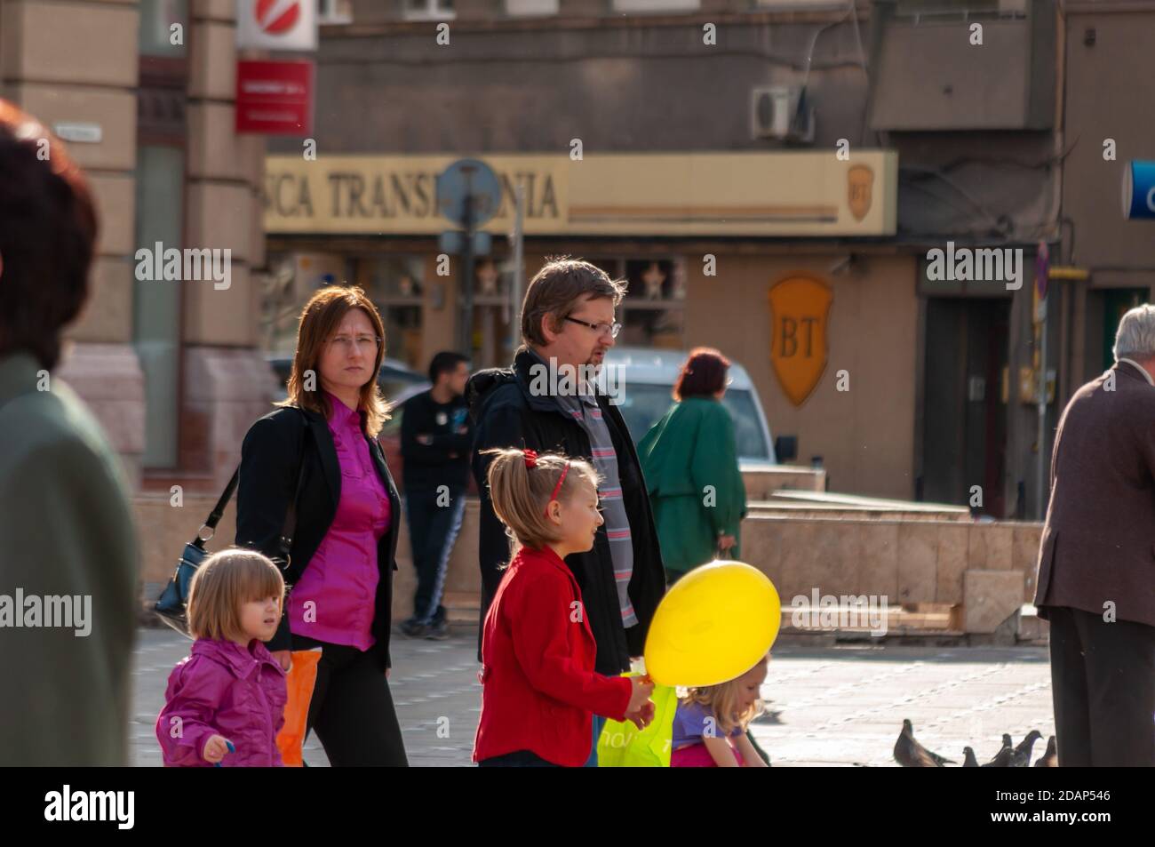 Timisoara, Romania - June 02, 2013: People walking on the street. Real ...