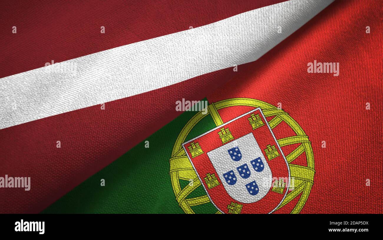 Latvia and Portugal two flags textile cloth, fabric texture Stock Photo ...