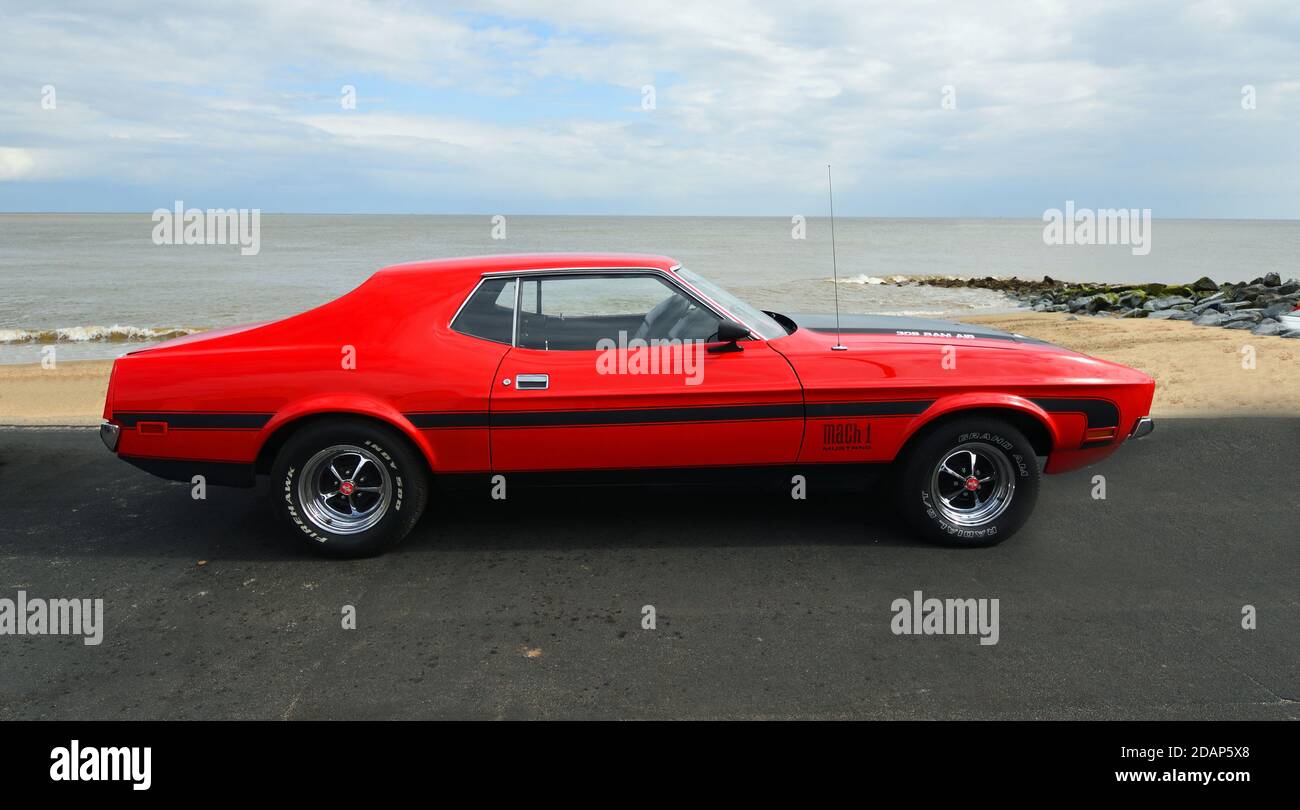 Classic red Ford Mustang parked on seafront promenade Stock Photo - Alamy