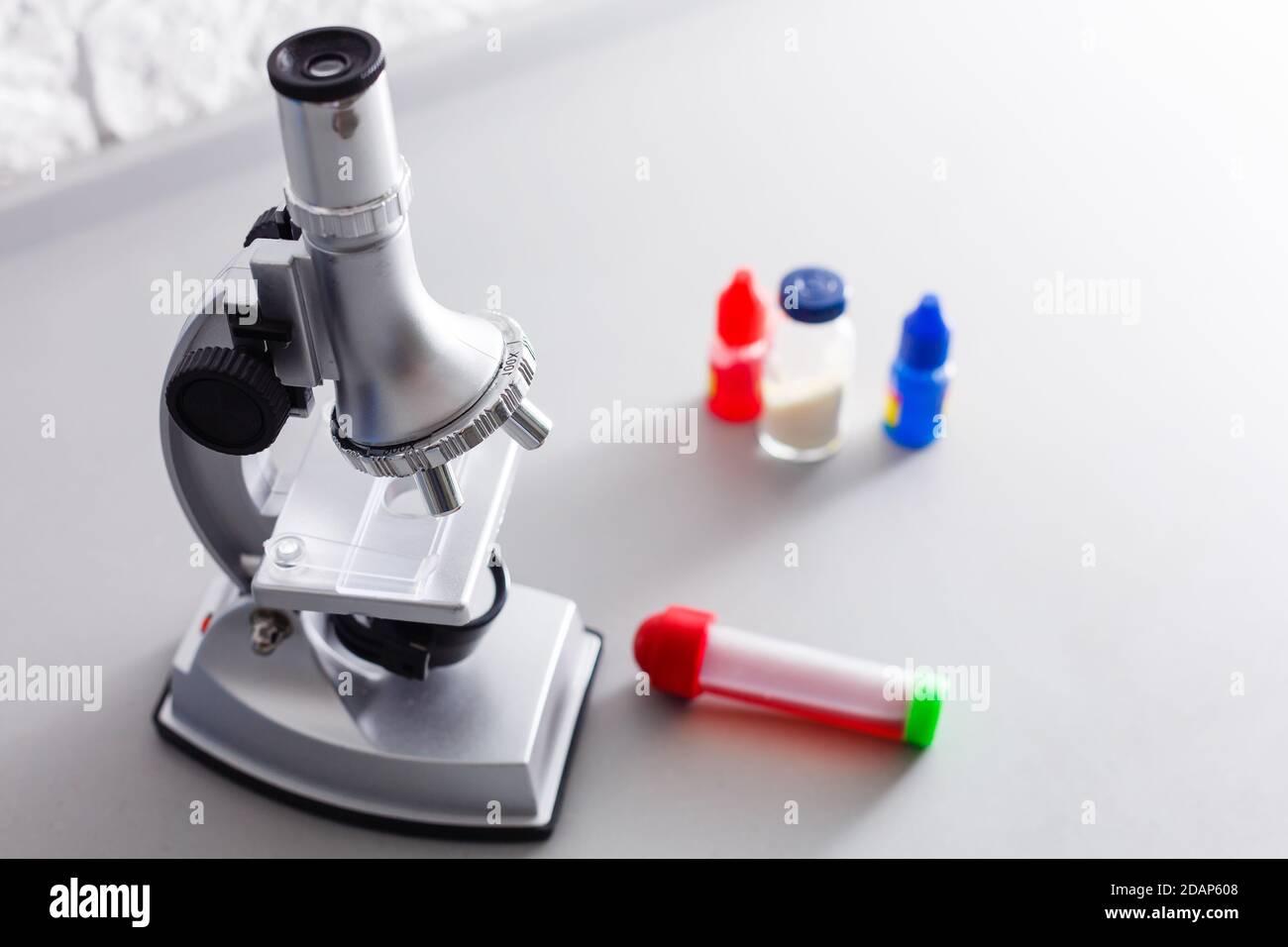 Laboratory lens of Microscope blue scientific research background Stock ...