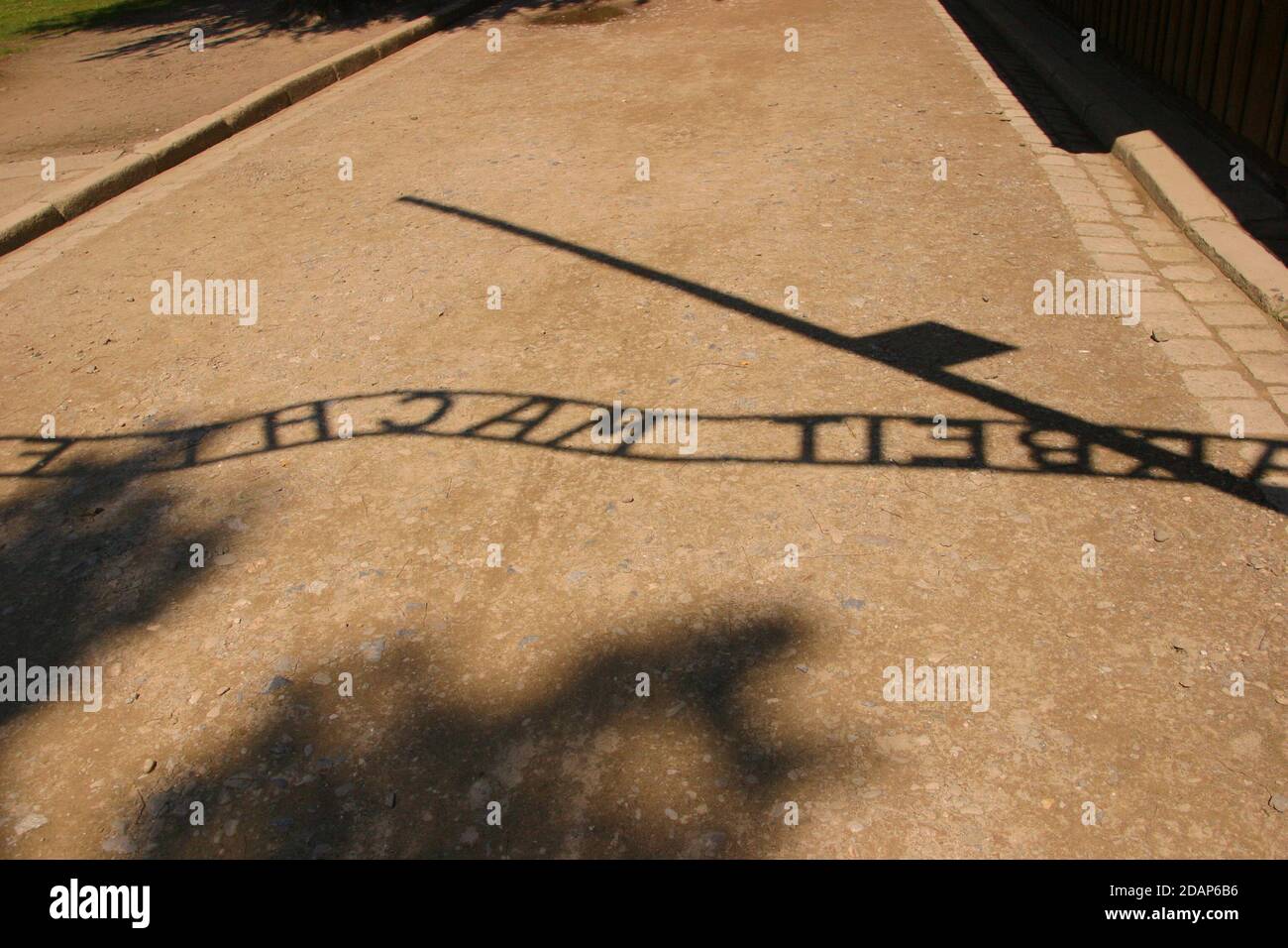 The main entrance and Arbeit Macht Frei sign above the gate. Auschwitz ...