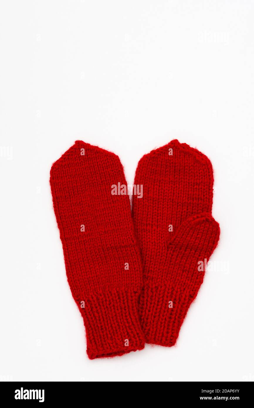 Red knitted winter mittens isolated on white background Stock Photo - Alamy