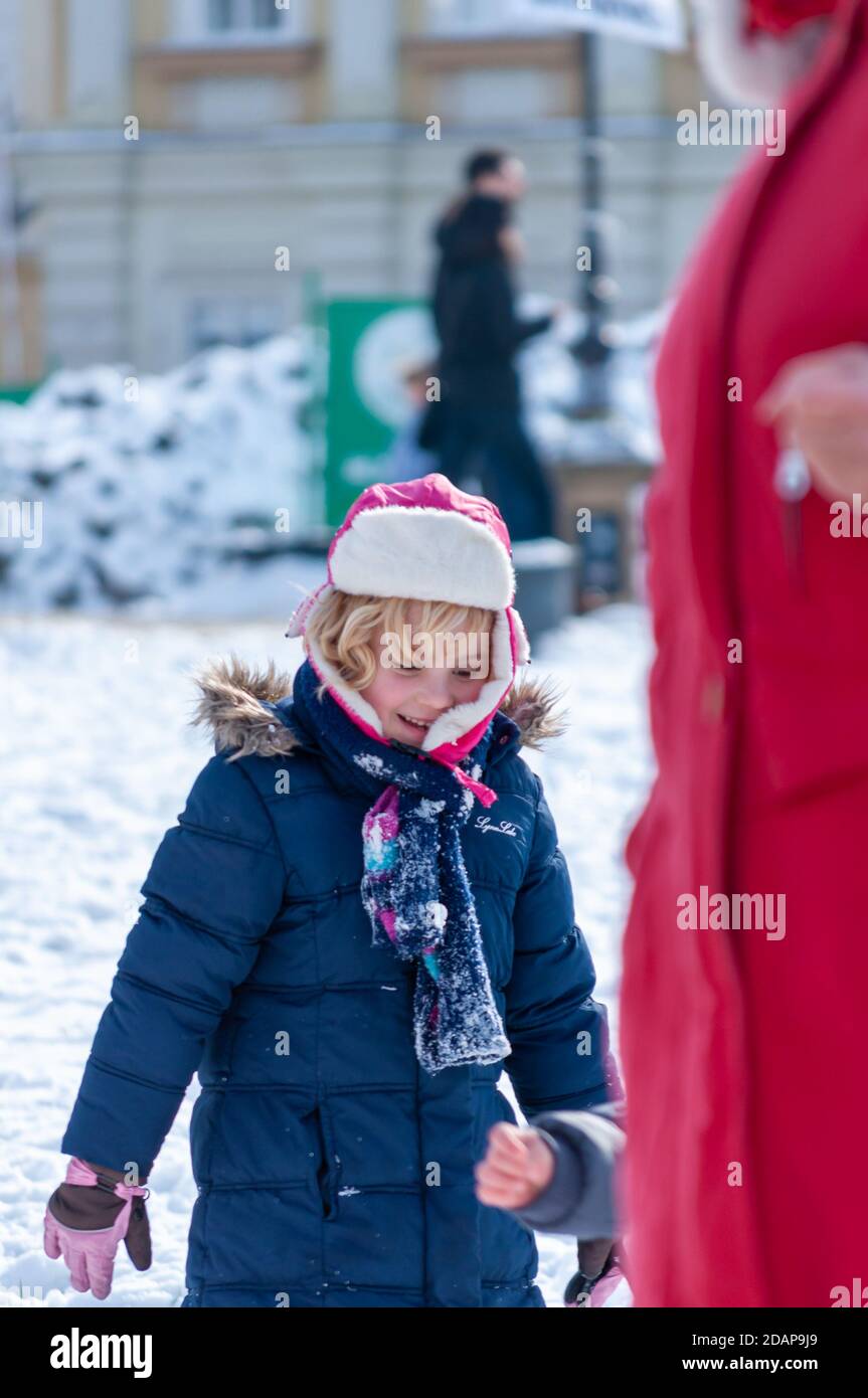 Timisoara, Romania - January 30, 2014: Kids playing with snow in the ...