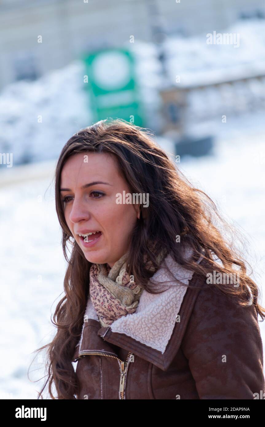 Timisoara, Romania - January 30, 2014: Portrait of a girl walking on ...