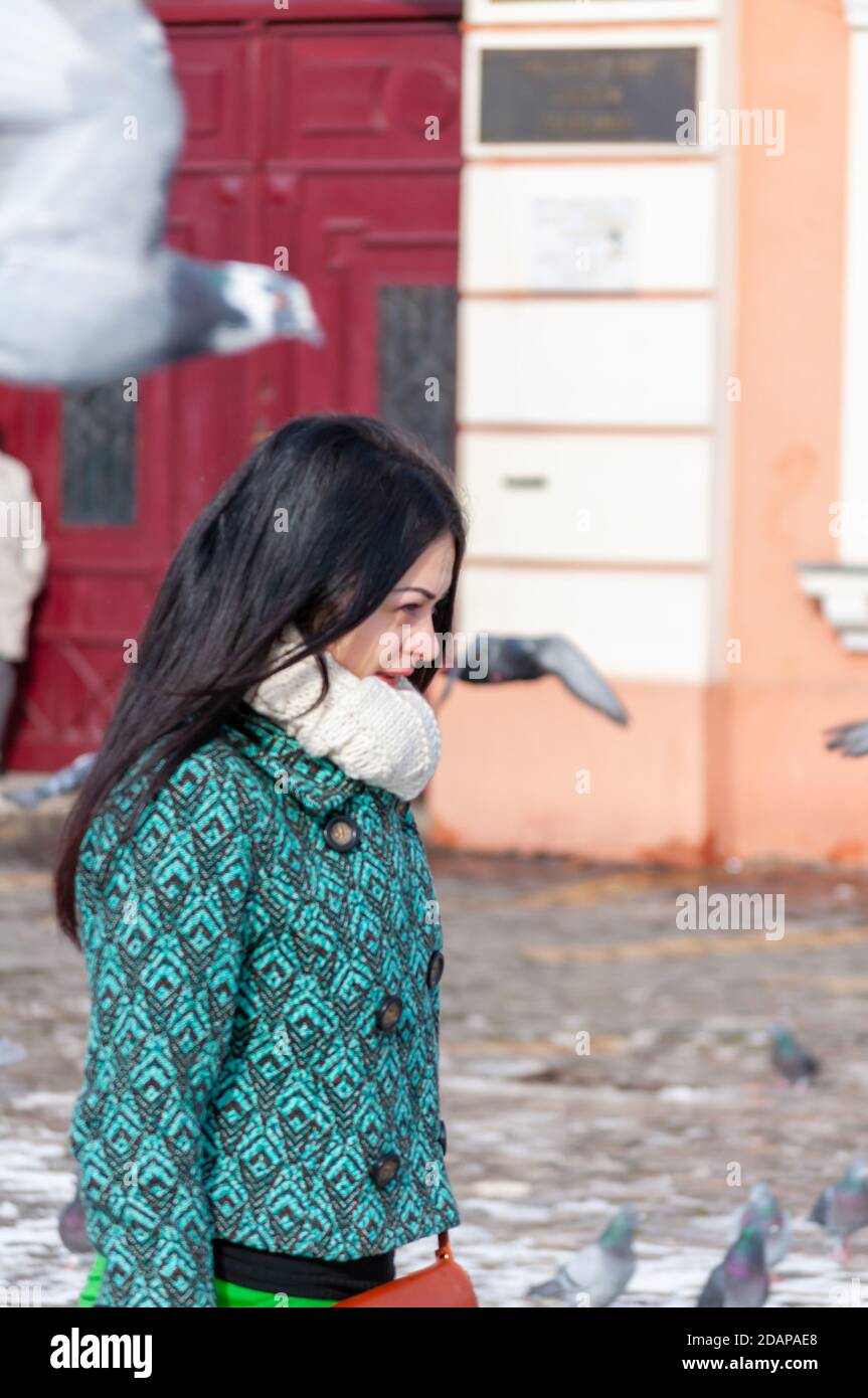 Timisoara, Romania - January 30, 2014: Portrait of a girl walking on ...