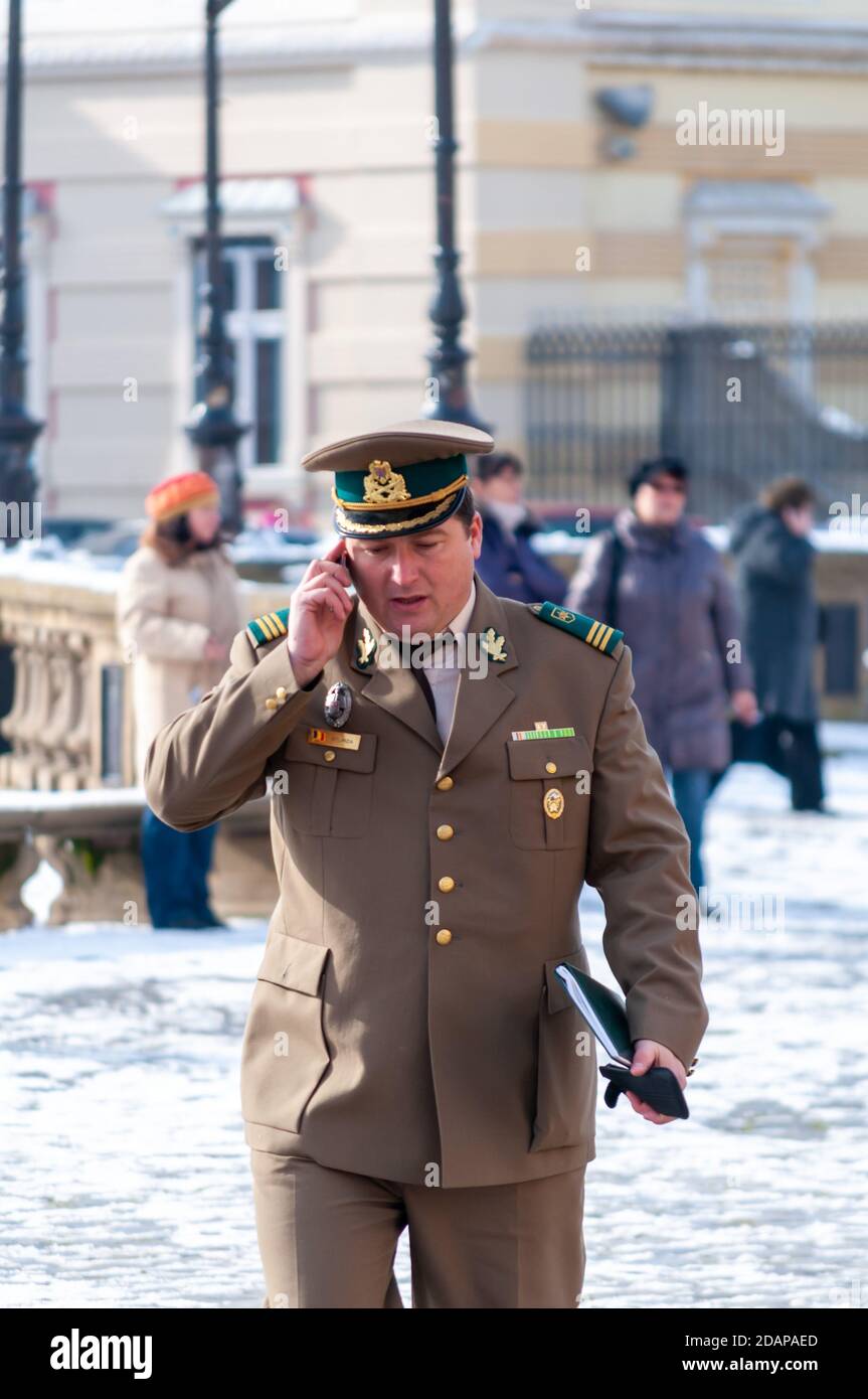 Timisoara, Romania - January 30, 2014: Man walking on the street ...