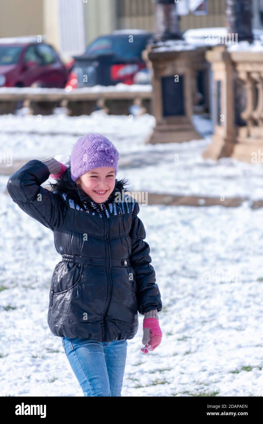Timisoara, Romania - January 30, 2014: Kids playing with snow in the ...
