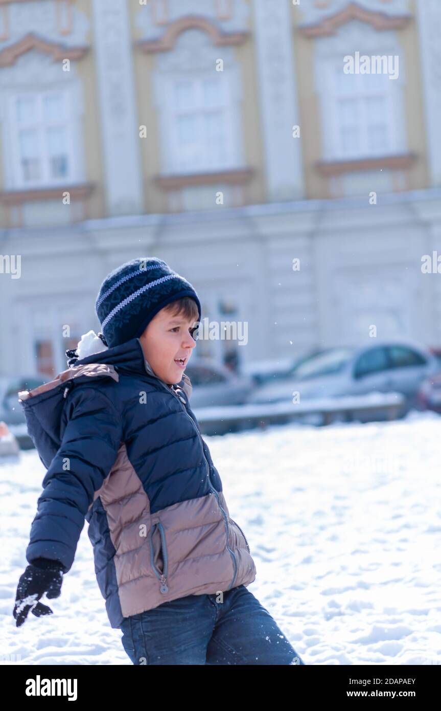 Timisoara, Romania - January 30, 2014: Kids playing with snow in the ...