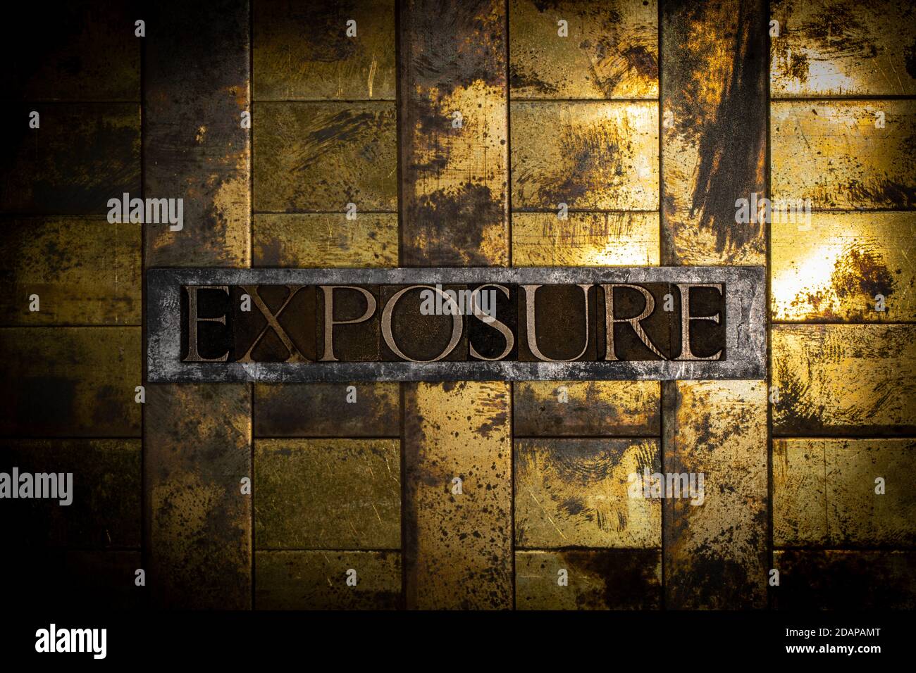 Exposure text message on vintage textured grunge copper and gold ...