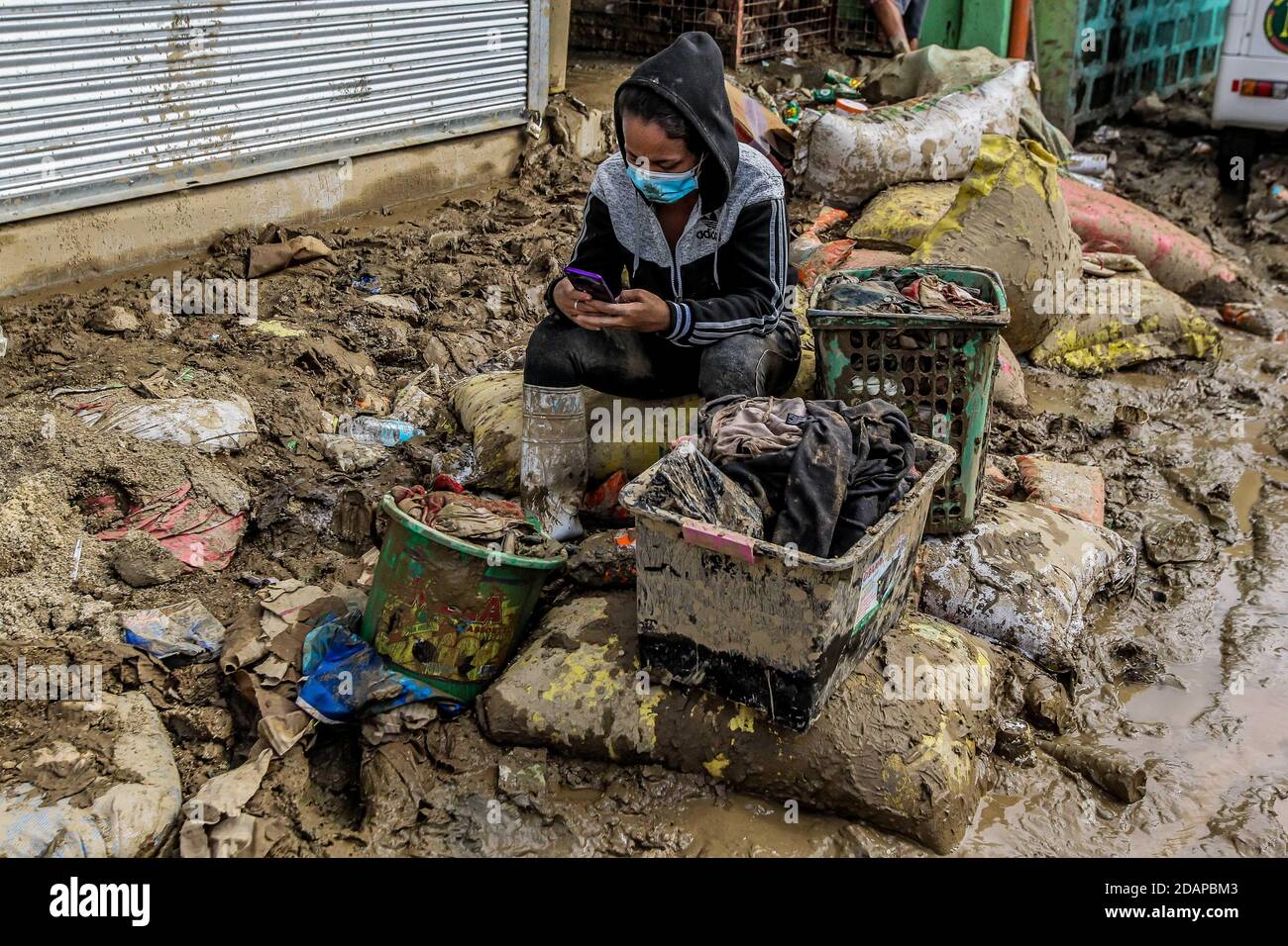 Rizal, Philippines. 14th Nov, 2020. A resident takes a rest as ...