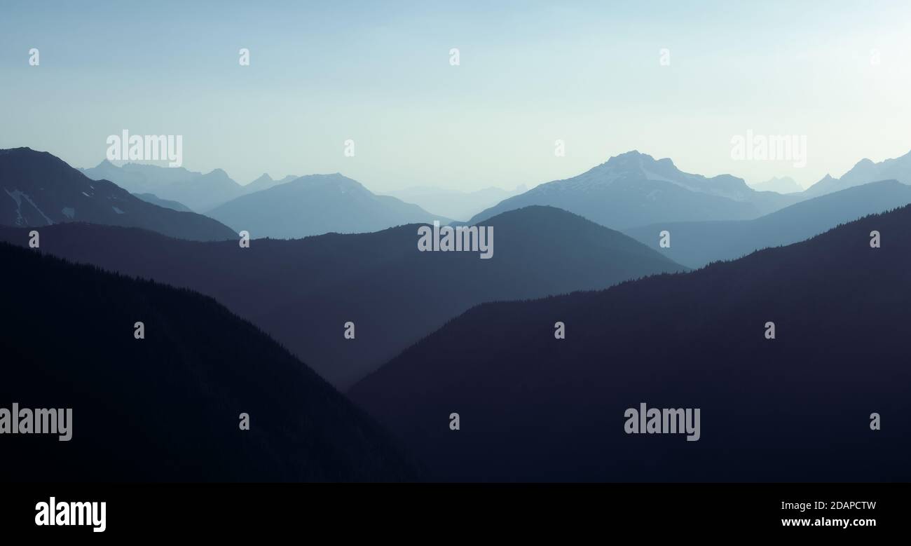 Endless layers of hazy mountains in the Pacific Northwest Stock Photo ...