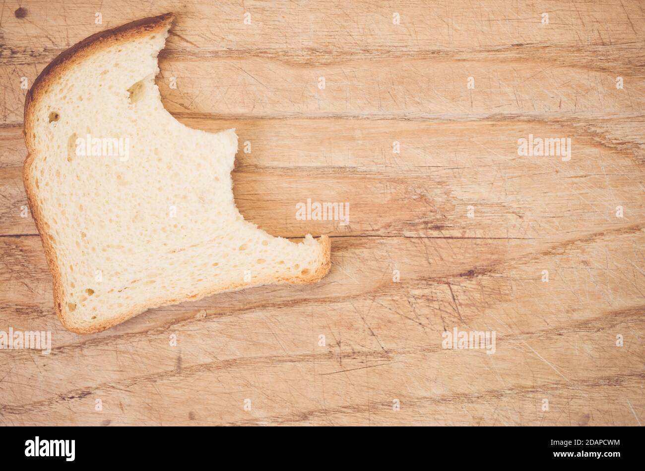 Bitten loaf of bread hi-res stock photography and images - Alamy