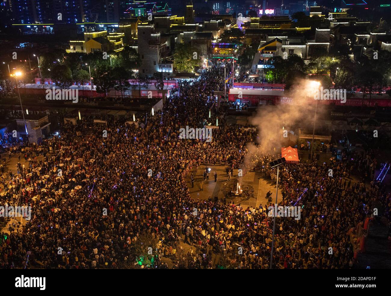 Beichuan, China's Sichuan Province. 14th Nov, 2020. People dance around ...