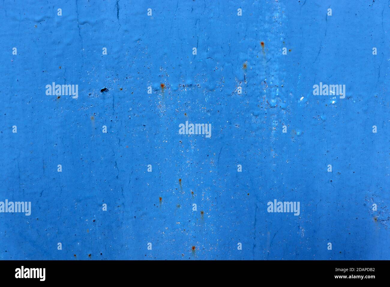 Abstract blue old paint background. Rusty texture with crack dry paint ...