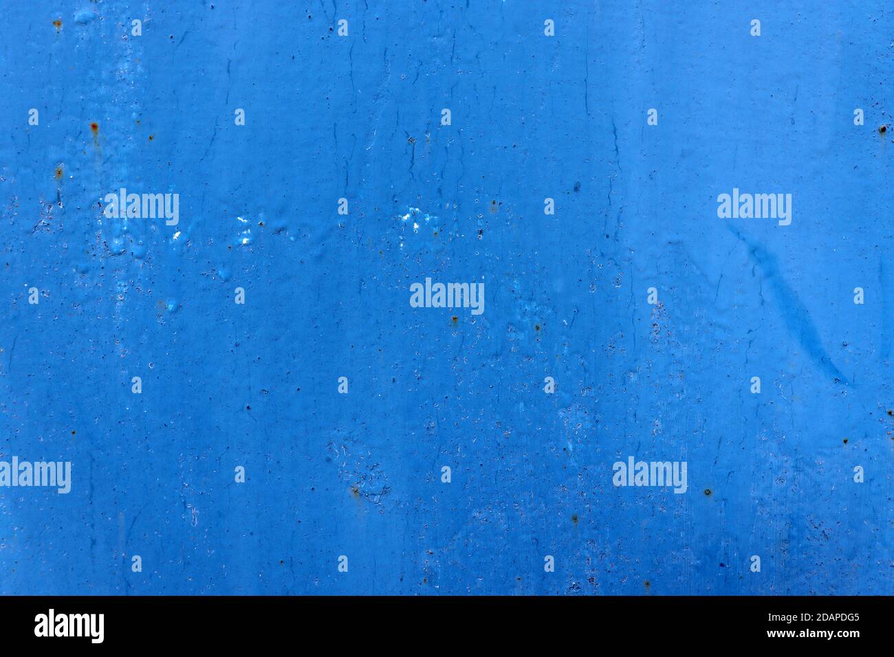 Old scratched blue dry paint on crack iron wall. Blue texture ...