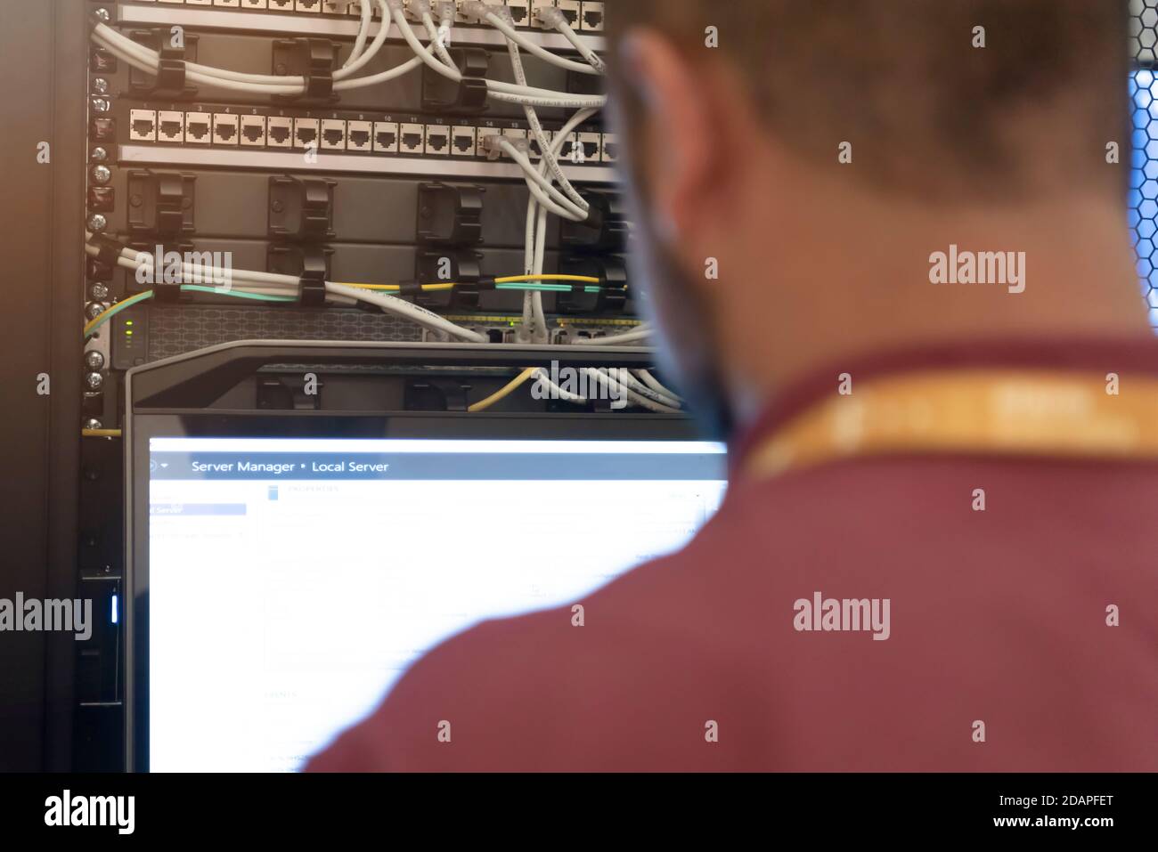 Young it engeneer business man with thin modern aluminium laptop in ...