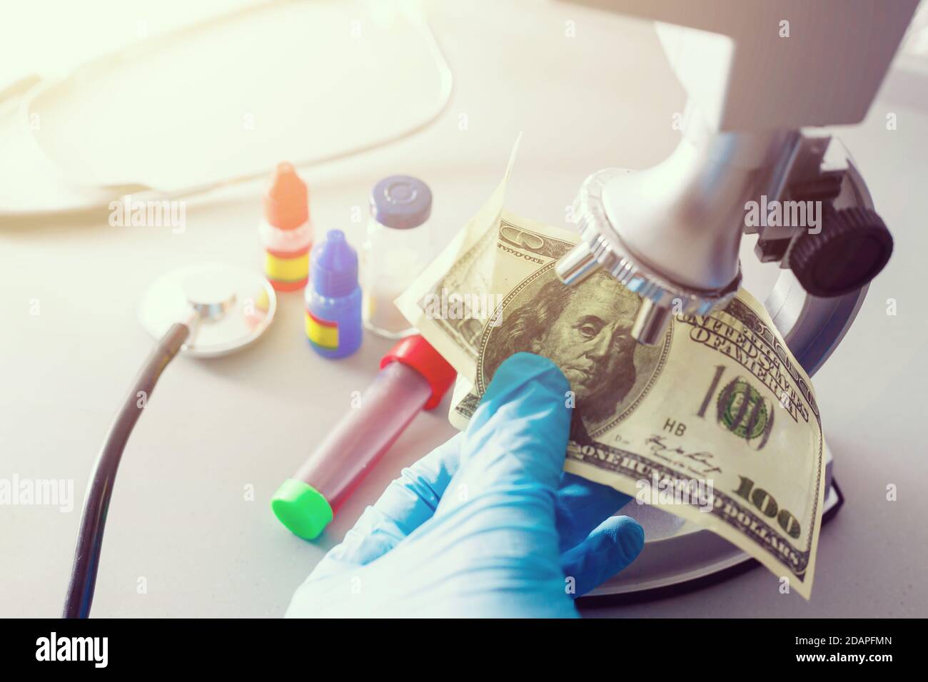 USA money under a microscope Stock Photo - Alamy