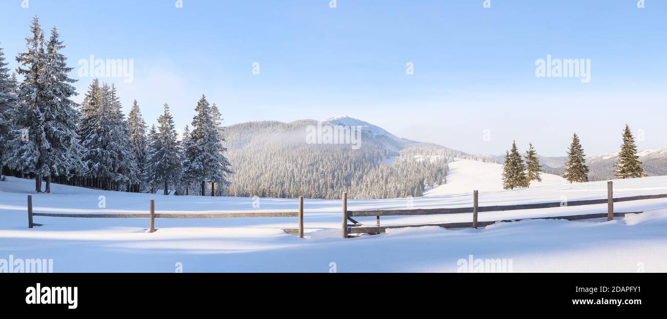 Winter scenery. Wooden fence. Panoramic view. Beautiful landscape of ...
