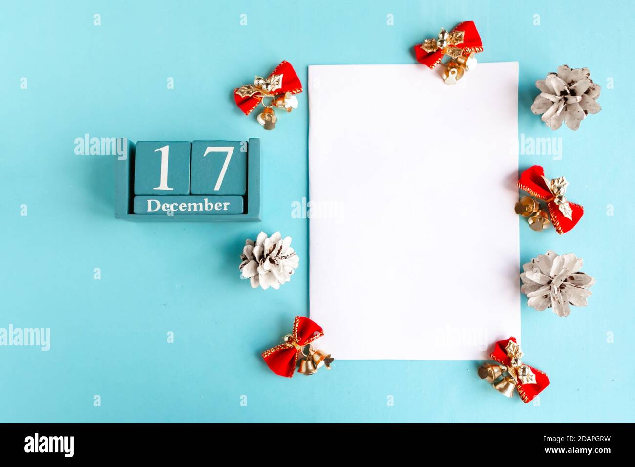 December 17. Blue cube calendar with month and date and white mockup ...