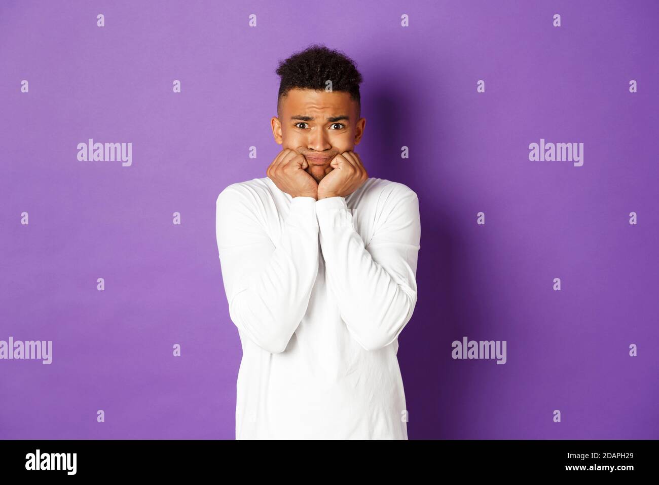 Image of insecure and scared african-american man, trembling from fear ...