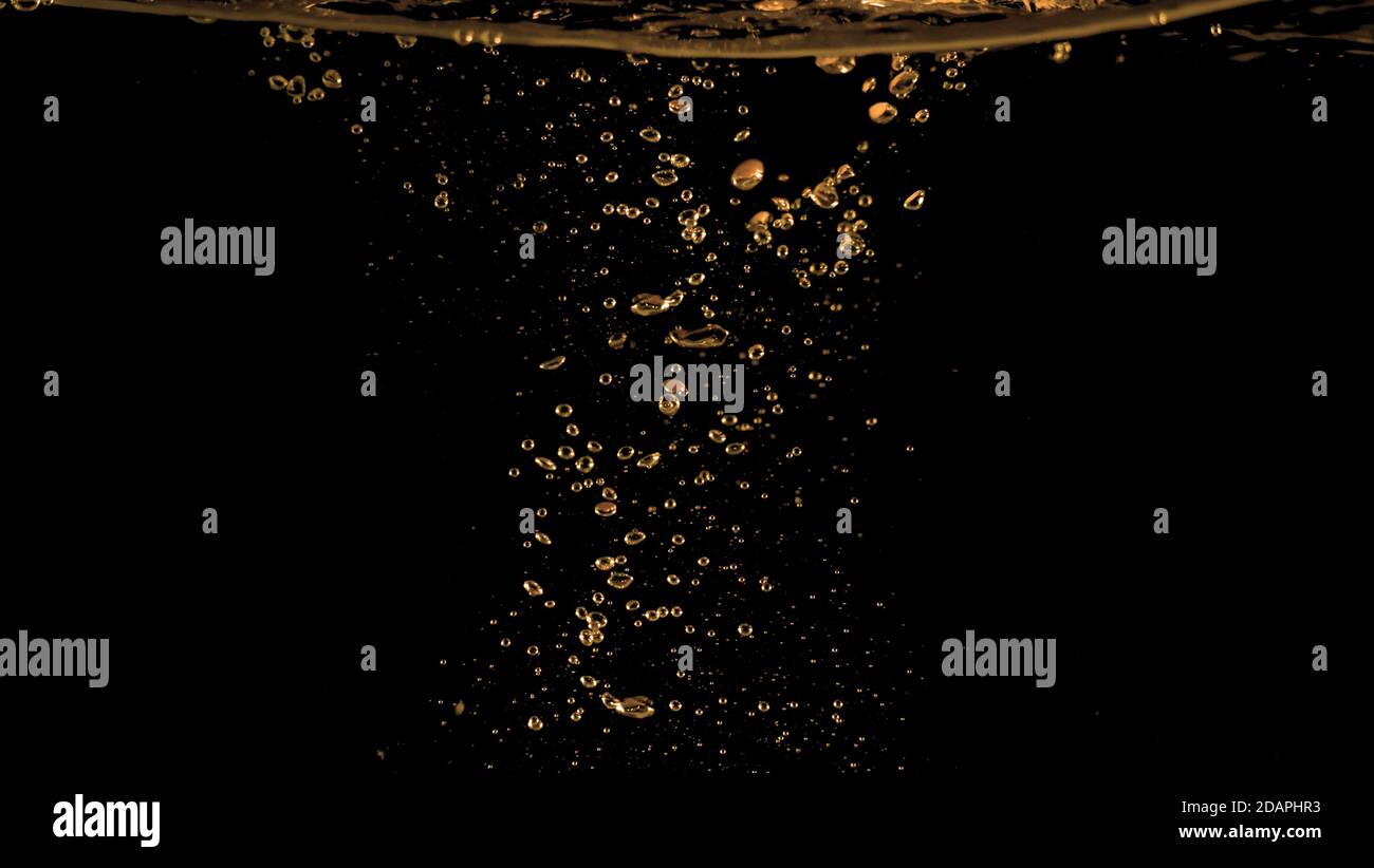 Close up images of oil bubbles from diesel gasoline splashing and ...
