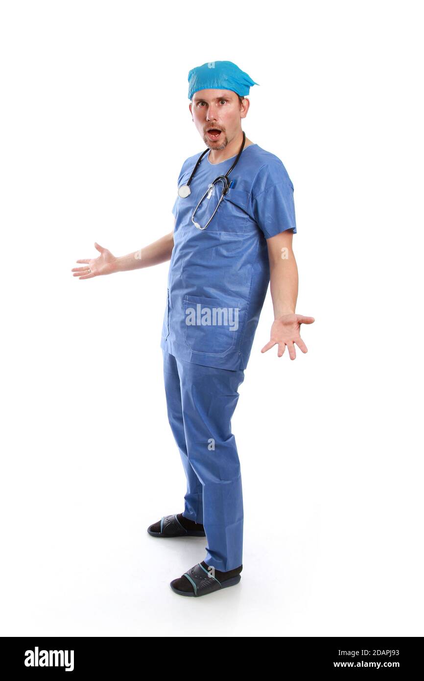 A vertical shot of a young male shocked doctor isolated on white ...