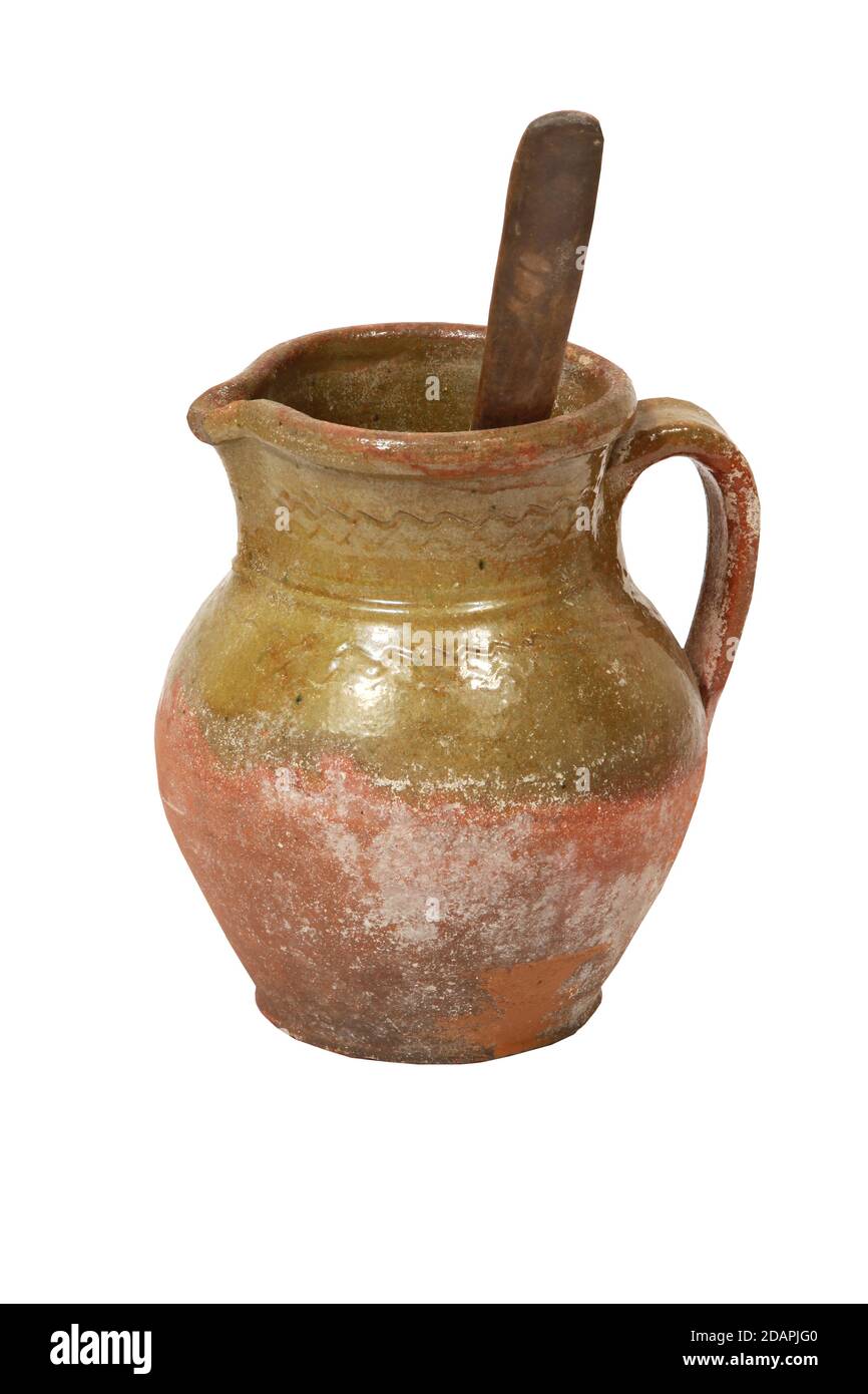 Vertical shot of a clay jug isolated on white background Stock Photo ...