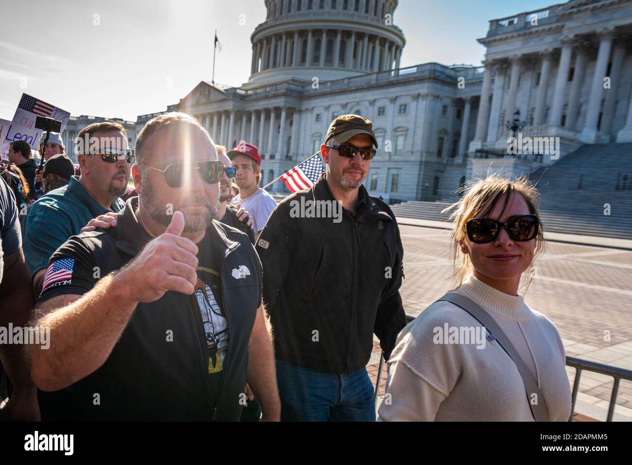 Pushing through crowd hi-res stock photography and images - Alamy