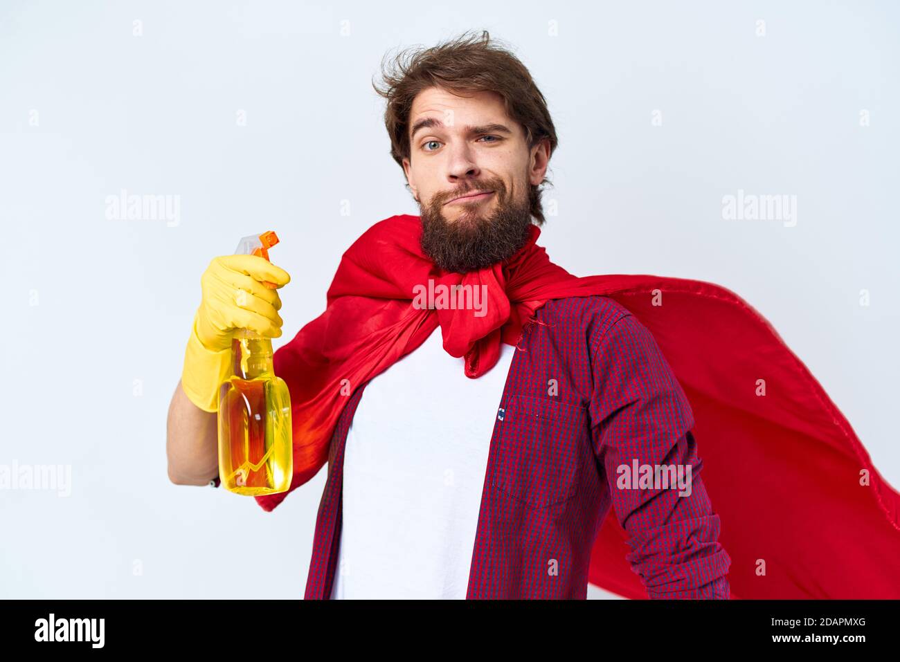 Man with detergent cleaning professional red raincoat cropped view of ...