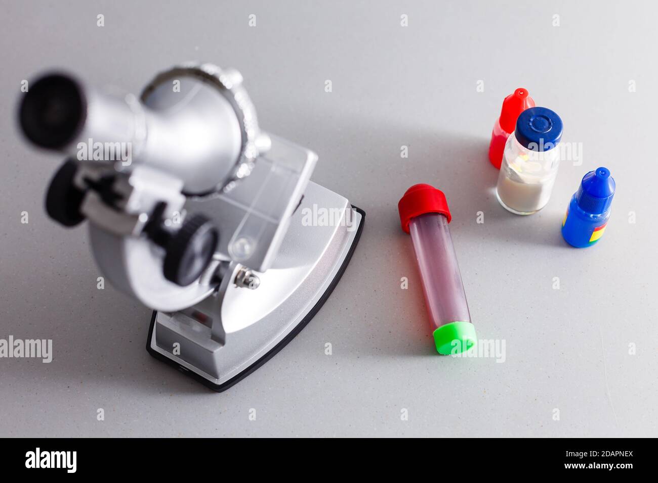 Laboratory lens of Microscope blue scientific research background Stock ...