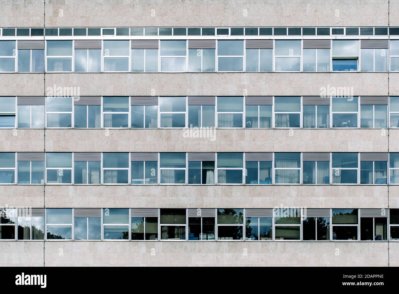 Minimalist modern building with glass windows Stock Photo - Alamy