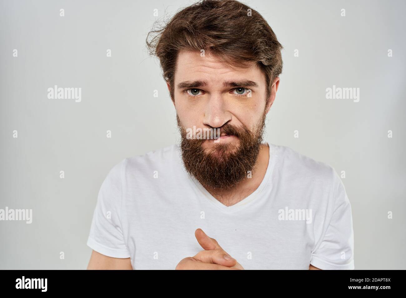 emotional bearded man close-up facial expression studio lifestyle Stock ...