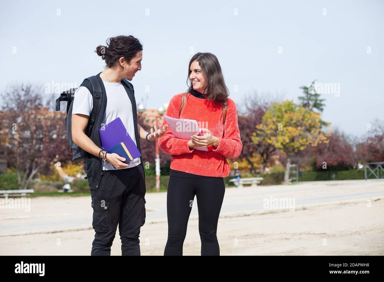 two happy university students at the school campus Stock Photo - Alamy