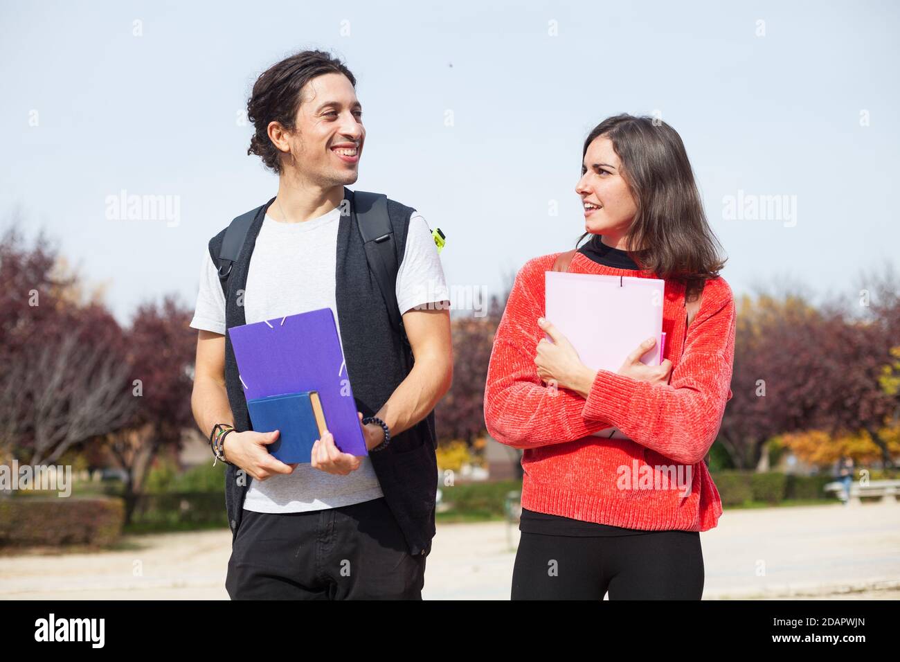 two happy university students at the school campus Stock Photo - Alamy