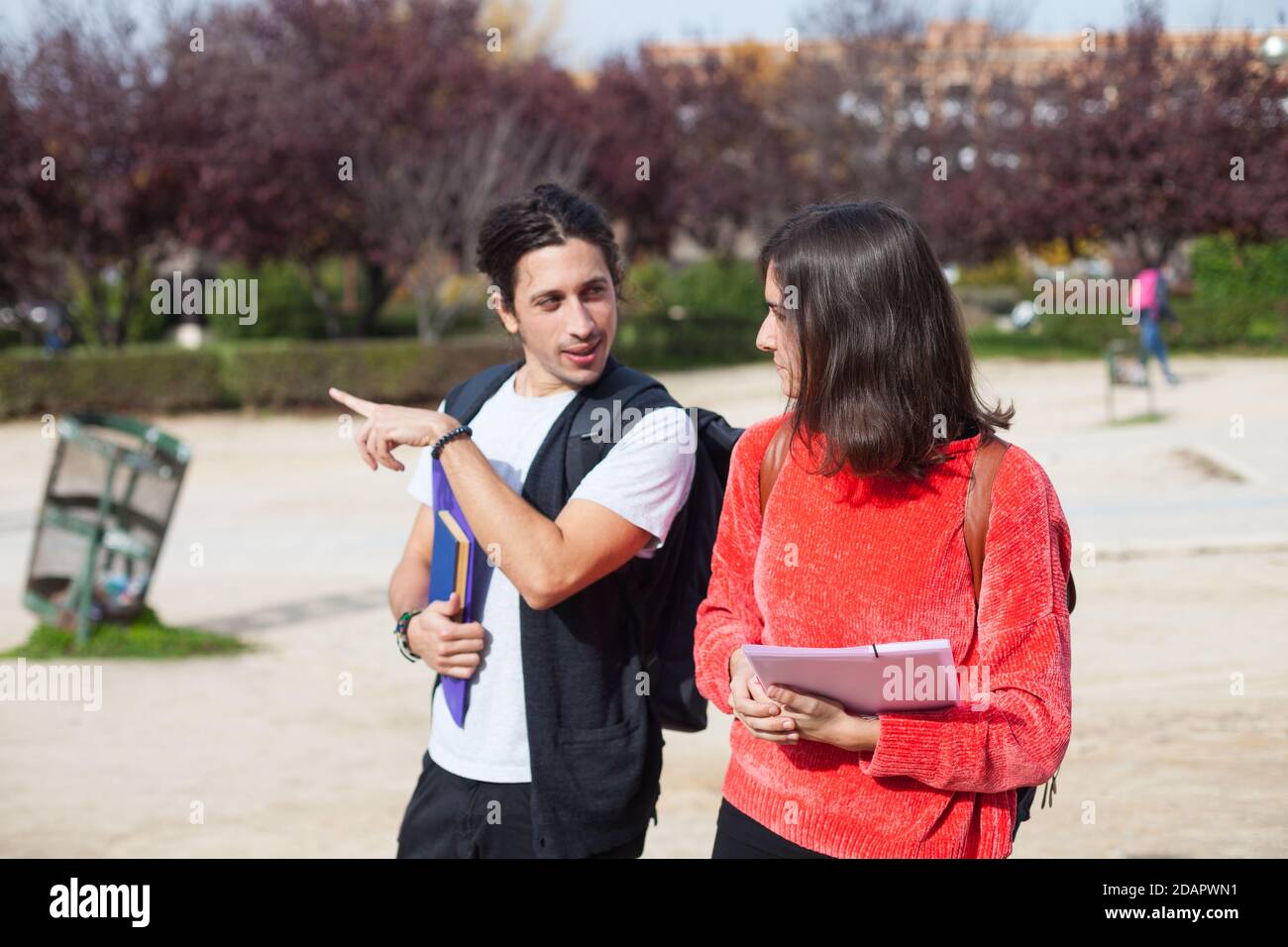 two happy university students at the school campus Stock Photo - Alamy