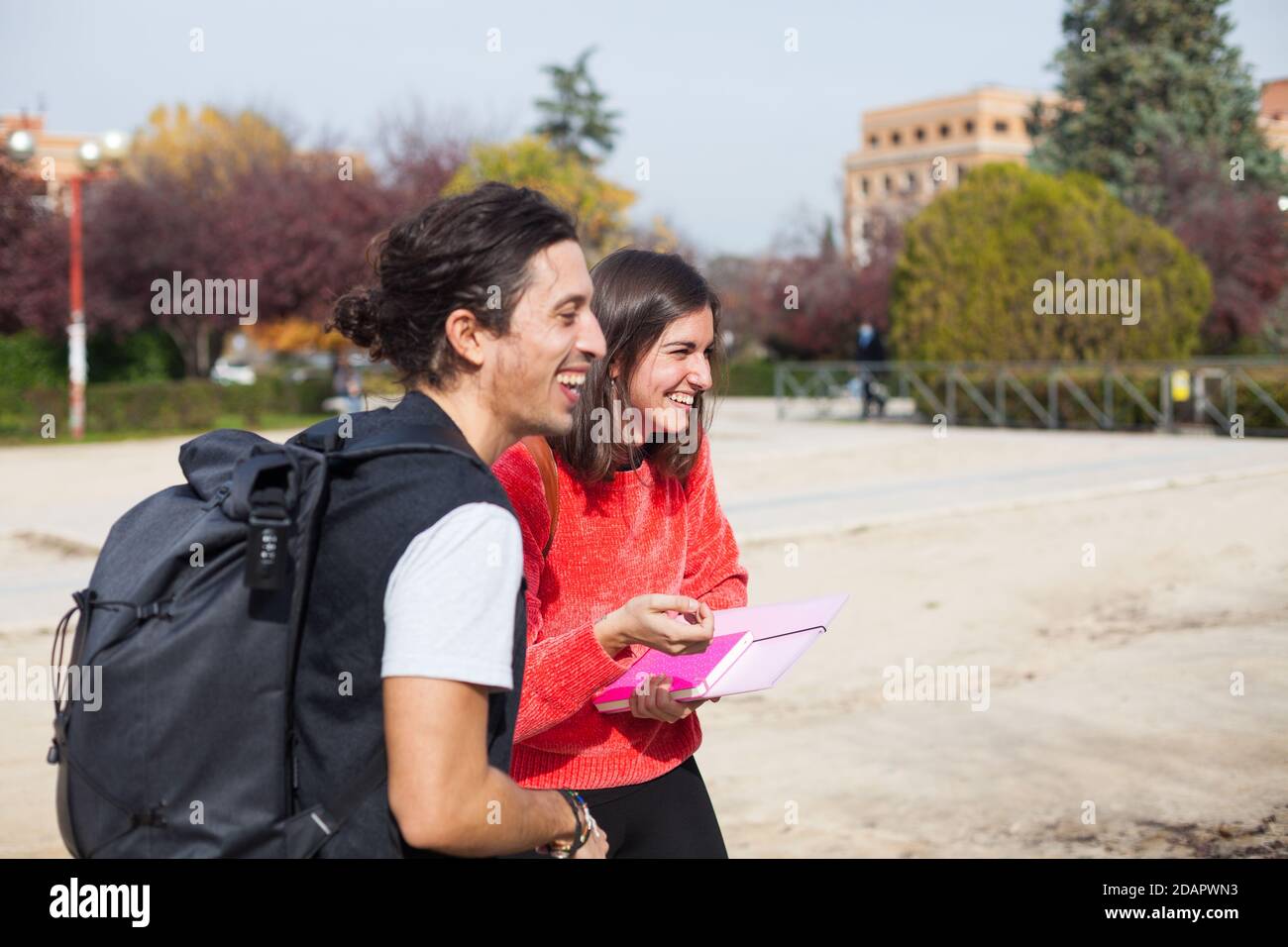 two happy university students at the school campus Stock Photo - Alamy