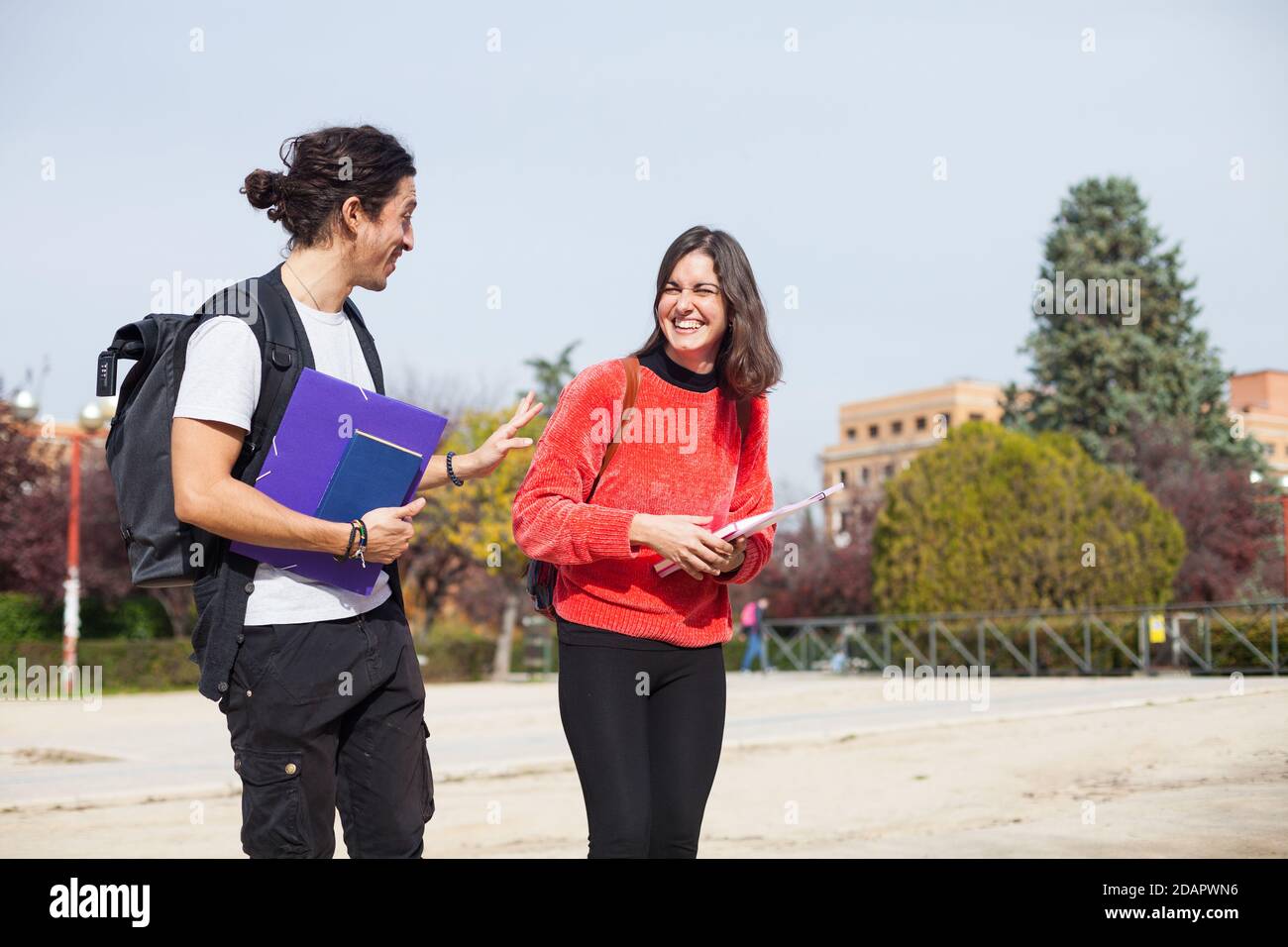 two happy university students at the school campus Stock Photo - Alamy
