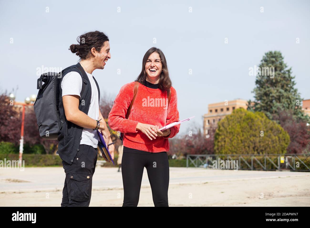 two happy university students at the school campus Stock Photo - Alamy