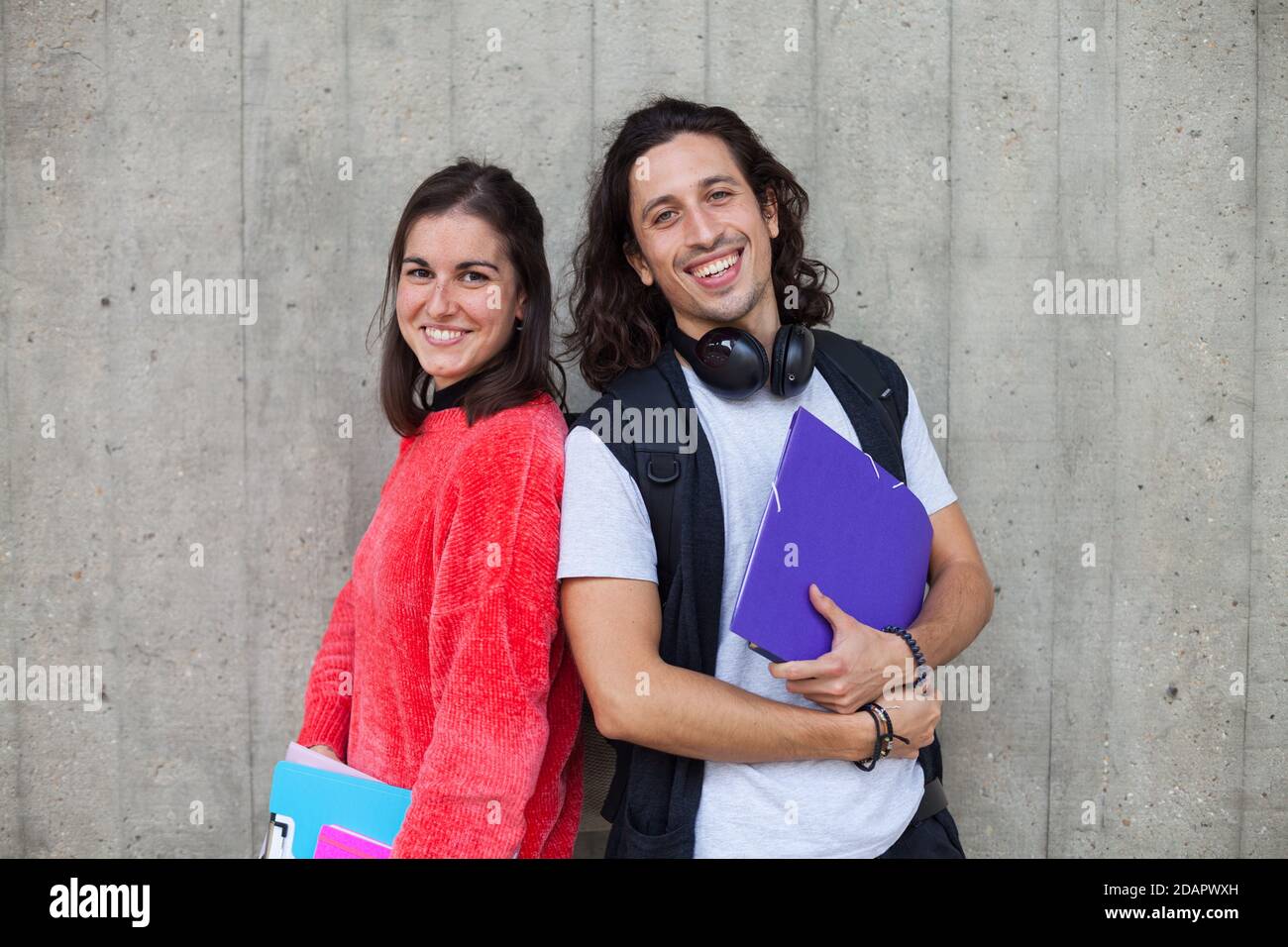two happy university students at the school campus Stock Photo - Alamy