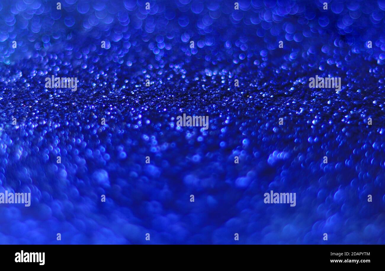 Pile of shiny blue sequins, abstract background Stock Photo - Alamy