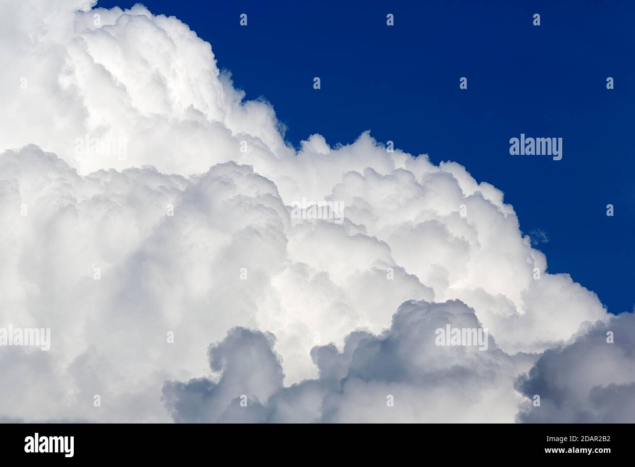 Cloud formation, white and grey cumulus clouds, cumulus clouds in front ...
