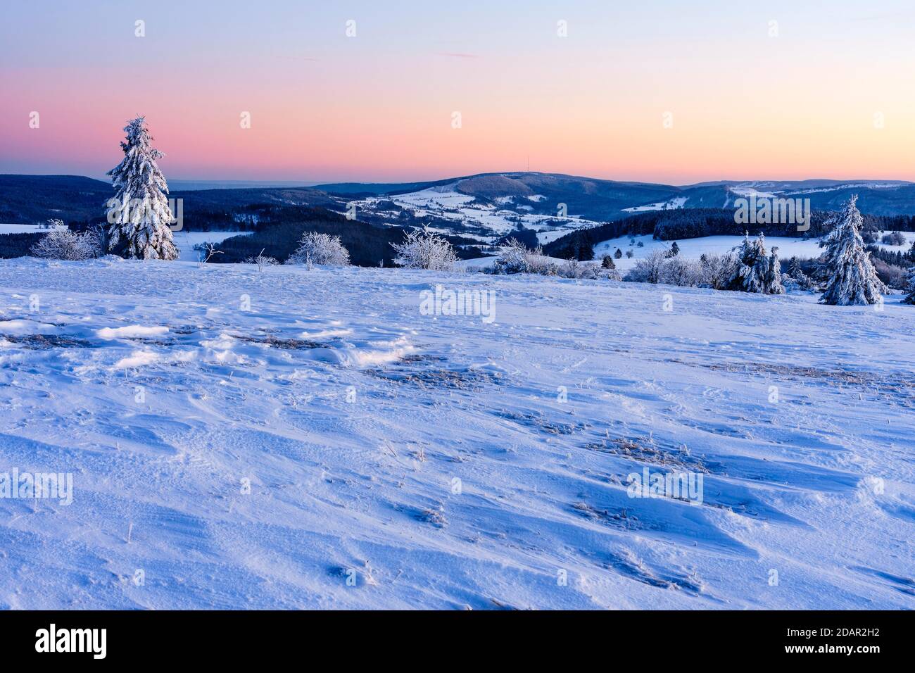 View from Wasserkuppe in south direction in winter, dusk, nature park ...