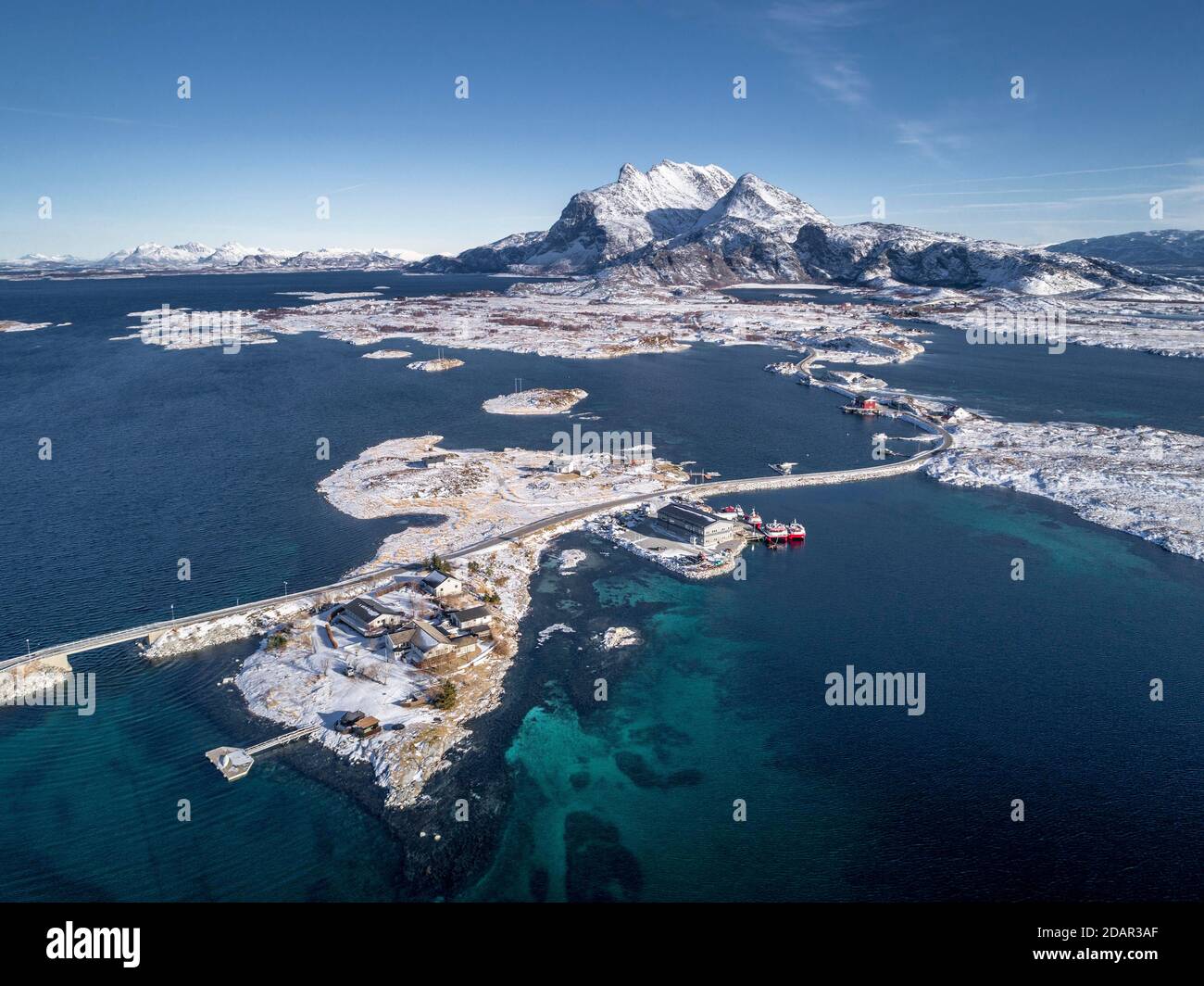 Aerial view, country road through the sea connects populated, small ...