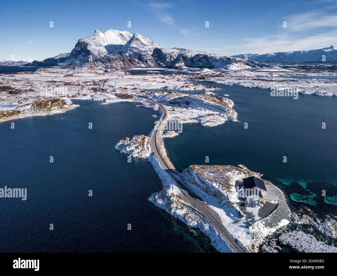 Aerial view, country road through the sea connects populated, small ...