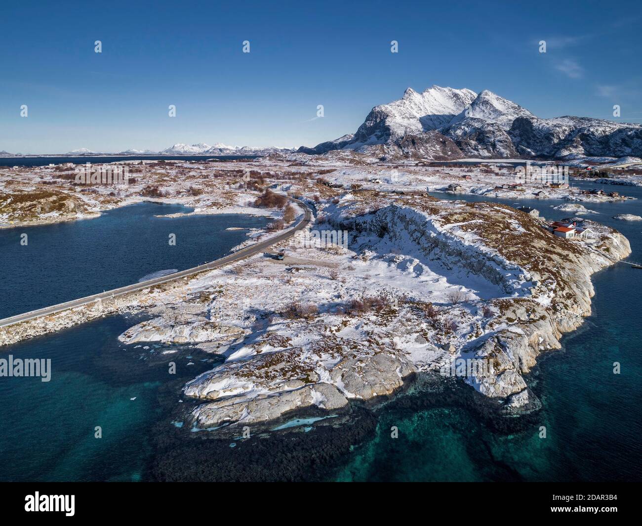 Aerial view, country road through the sea connects populated, small ...