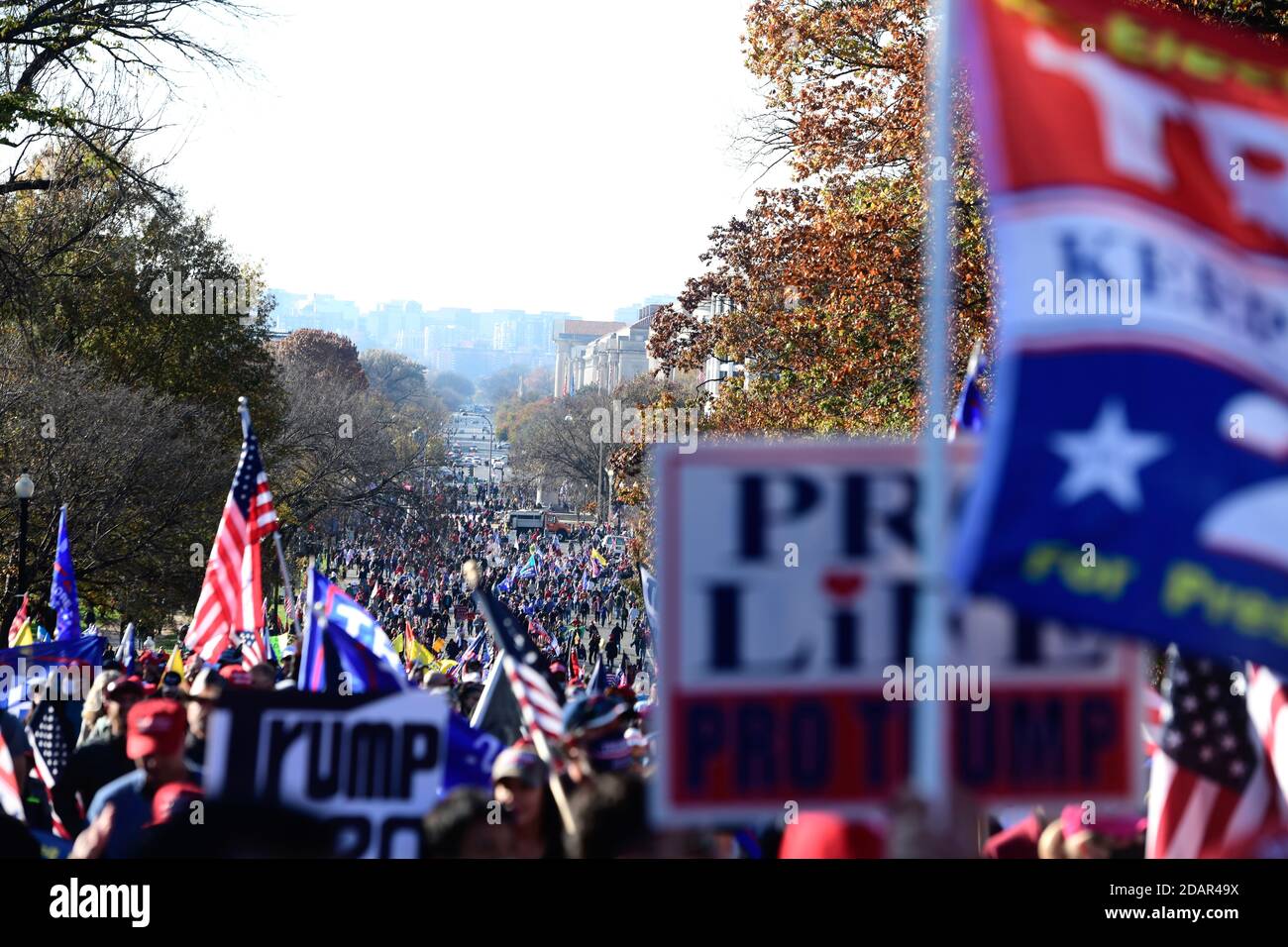Participants in the pro-Trump MAGA rally march up Constitution Avenue ...