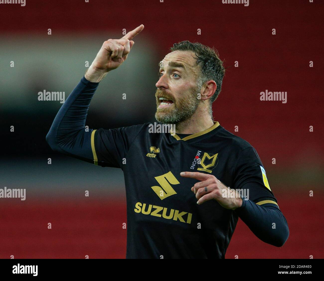 Richard Keogh #4 of Milton Keynes Dons makes a point Stock Photo - Alamy